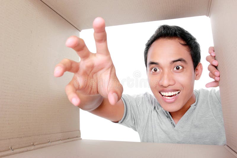 Man Trying To Take Something Inside Box Stock Photo - Image of reaching ...