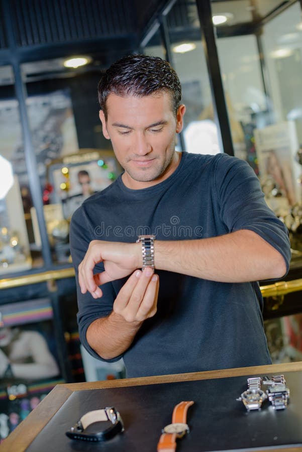Man Trying on Watch on Jewellers Stock Image - Image of business ...