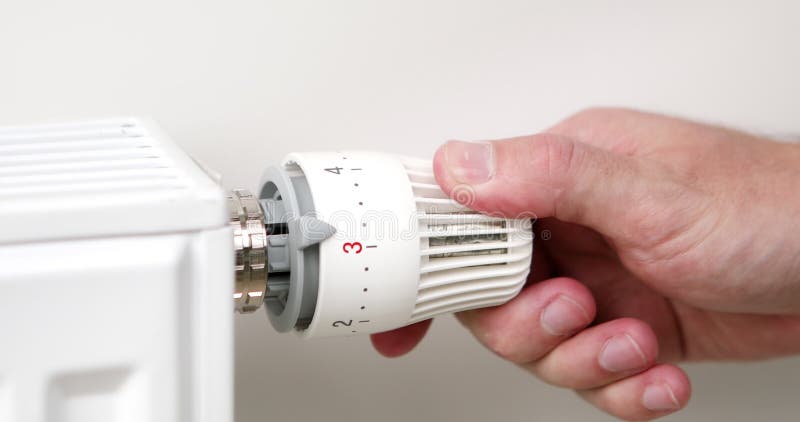 The Man Turns Off the Heating by Setting the Thermostat Stock Video ...