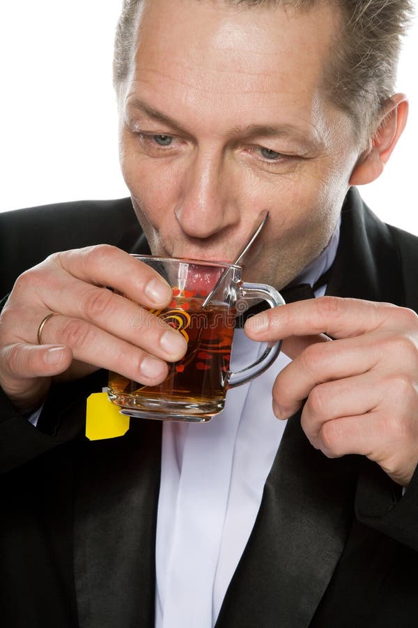 A Man in a Tuxedo Drinking Tea Stock Image - Image of person, activity ...