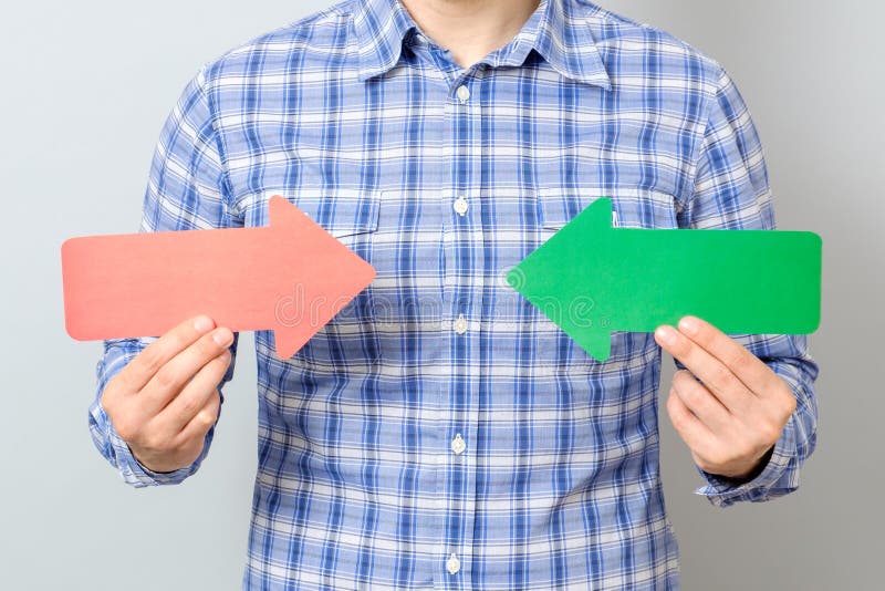 Man with Two Arrows Pointing To the Right and Left Stock Photo - Image ...