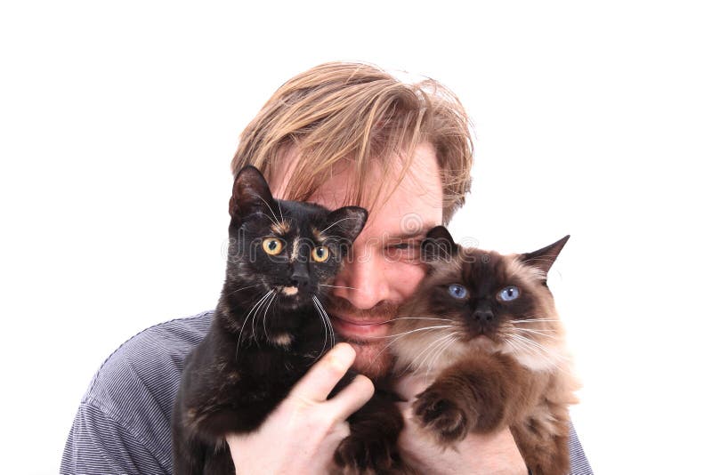 Young man petting cat stock image. Image of portrait - 21660785