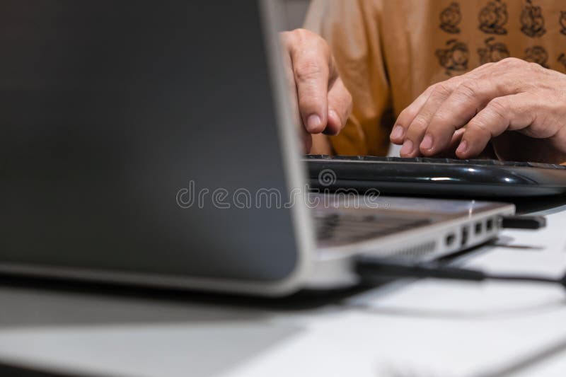 A Man Types Keyboard in Front of the Notebook Computer Stock Image ...