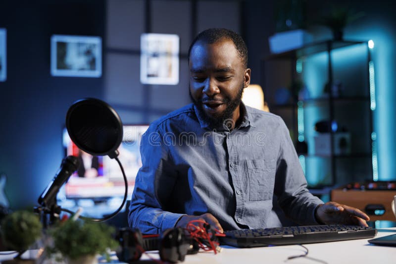 Man Types on Keyboard while Reviewing it Stock Photo - Image of online ...