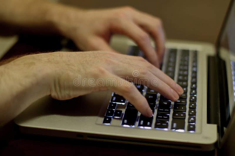 Man typing on computer stock image. Image of macbook - 79258375