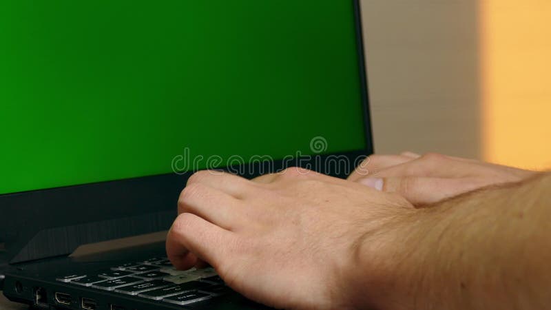 Man Typing Fast on Laptop Keyboard with Greenscreen. Stock Video ...