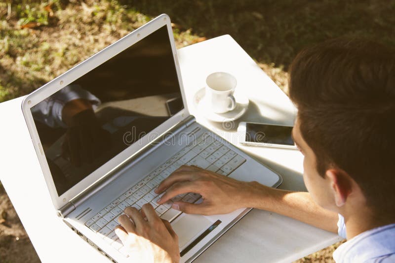 Man typing on laptop stock photo. Image of internet, autonomous - 77569674