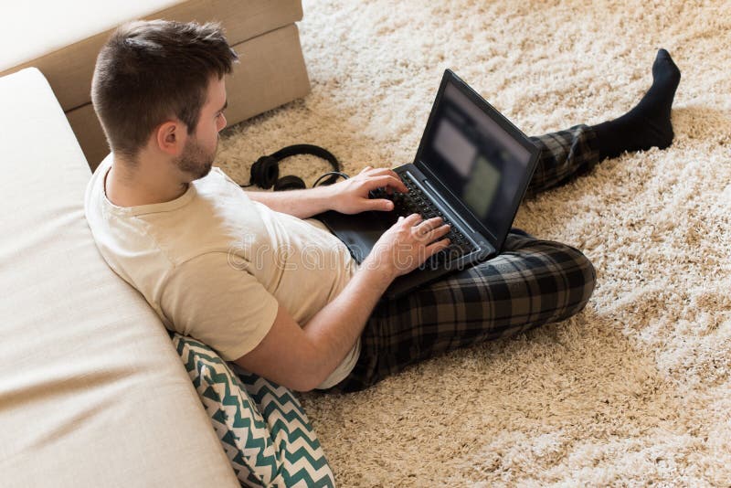 Man typing on laptop stock photo. Image of male, room - 53441078
