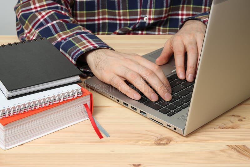 Man is Typing Something on the Laptop Stock Photo - Image of estimation ...