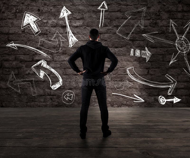 Man is Undecided about the Right Way To Follow Stock Photo - Image of ...