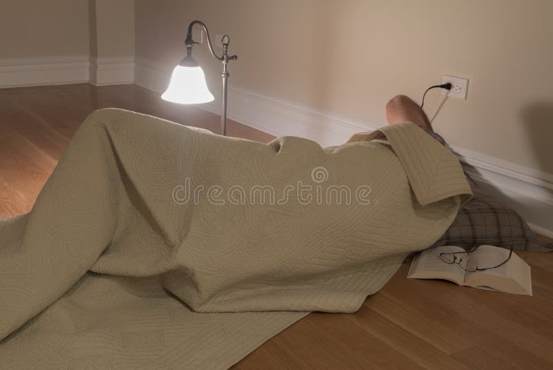 Man under blanket on floor stock image. Image of misery - 47774487
