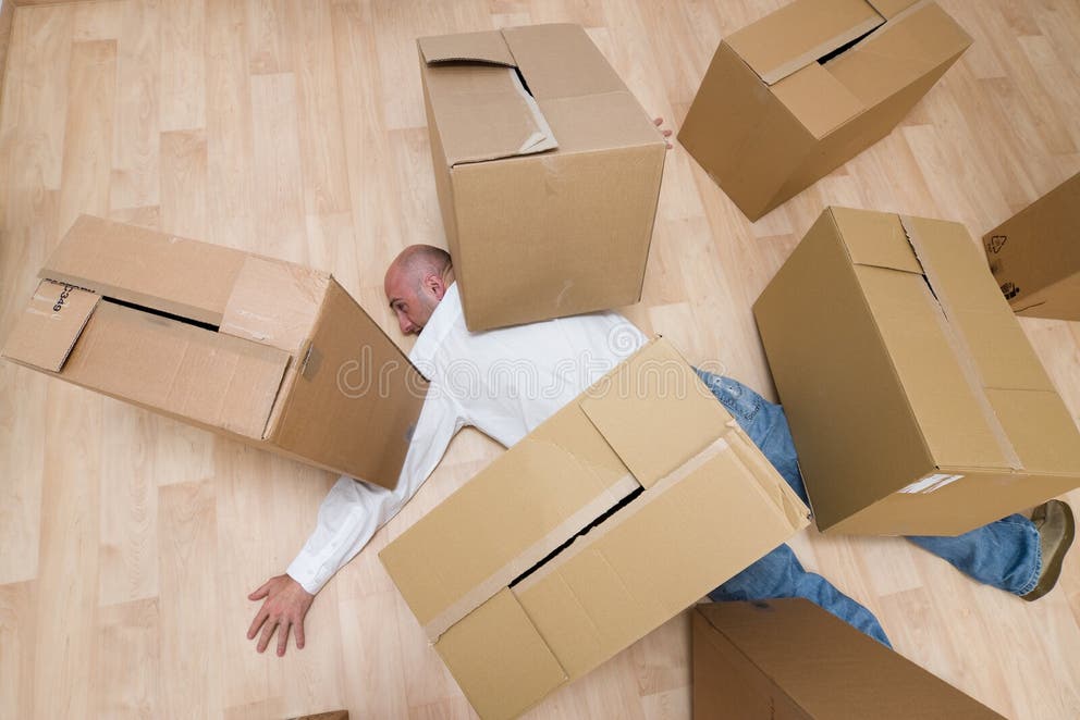 Man under boxes stock photo. Image of worker, casualty - 6401466