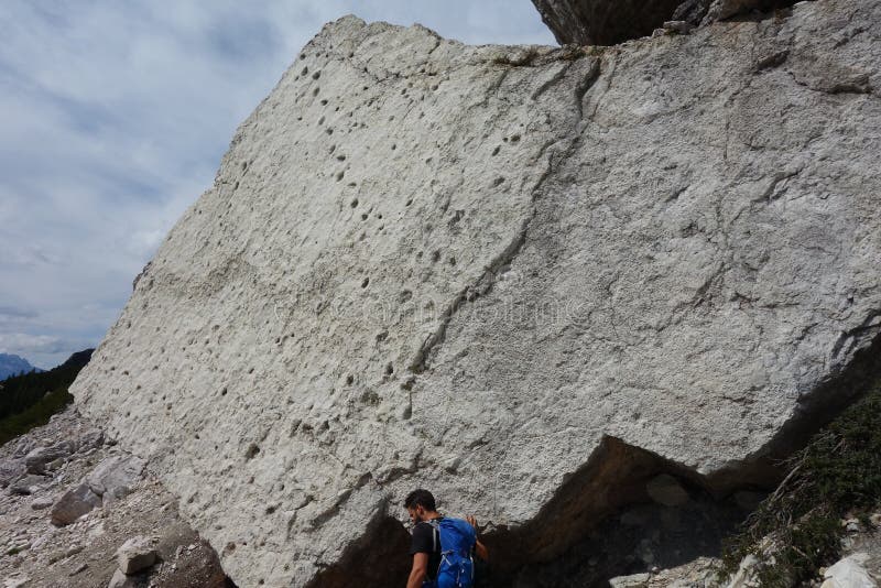 Man Under Fossil Rock on Pelmo Peak Editorial Photo - Image of tourism ...