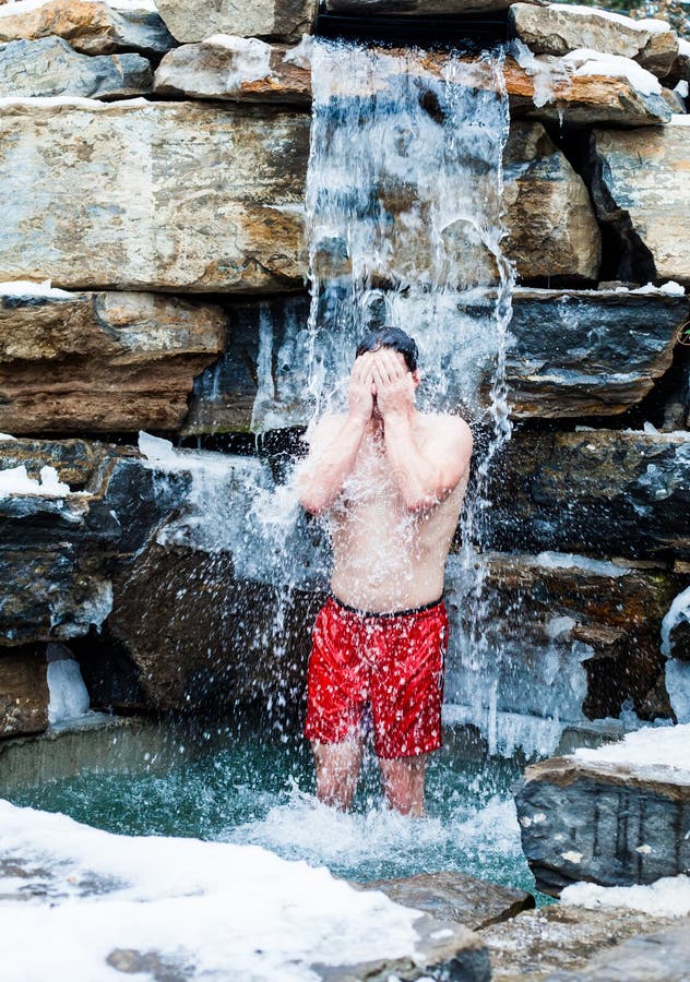 Man Under Nordic Cold Water Spa Cascade Stock Image - Image of ...