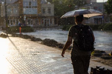 Man under rain editorial stock photo. Image of session - 74804313
