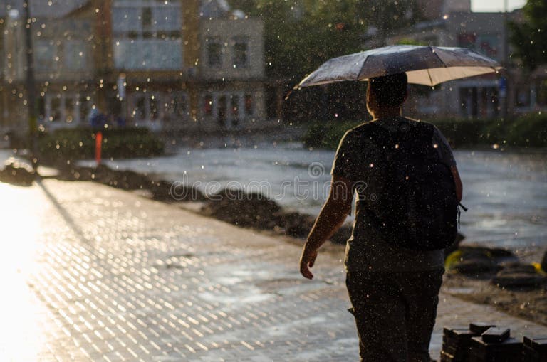 Man under rain editorial stock photo. Image of session - 74804313