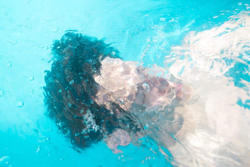 A man under the water stock image. Image of drowned, blue - 85720949