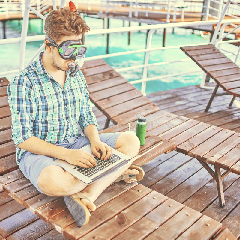 A Man is Working on Vacation. Stock Photo - Image of business, internet ...