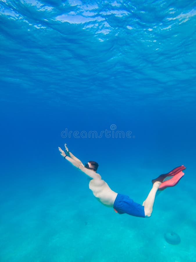 Man Underwater in Scuba Mask Diving Under Water Stock Image - Image of ...
