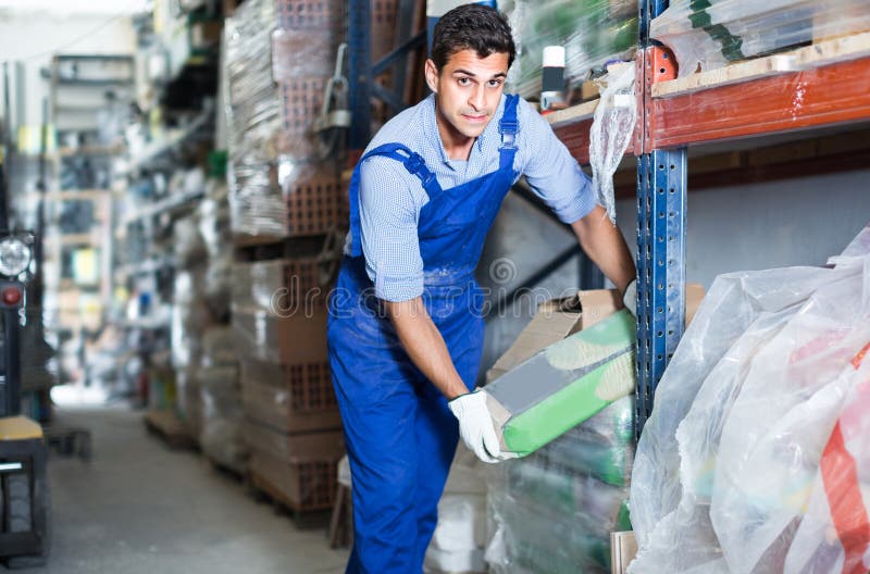 Man in Uniform is Choosing Cement Stock Photo - Image of construction ...