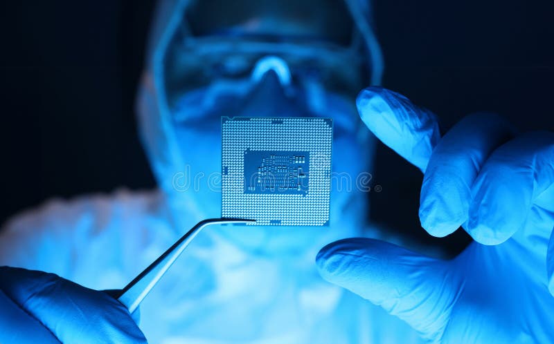 Man in Uniform Holds Microprocessor with Forceps Stock Image - Image of ...