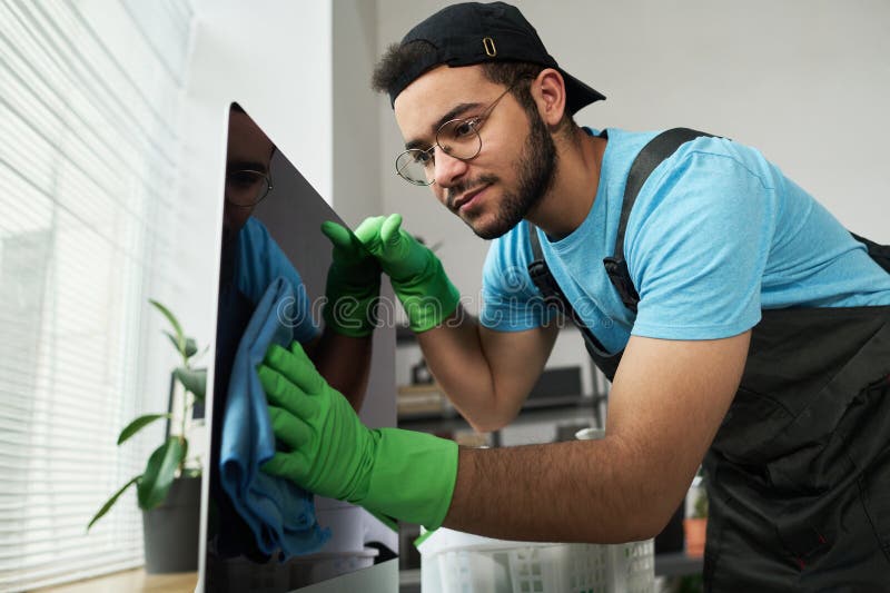 Man Wiping Dust from Computer during Cleaning Stock Image - Image of ...