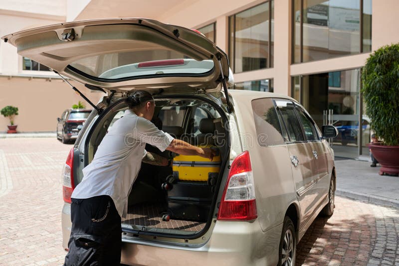 Driver Unloading Car stock image. Image of travel, airport - 287676393