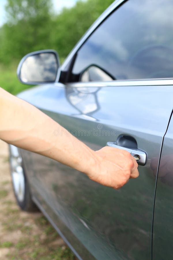 Man unlock car door by key stock image. Image of drive - 25605267