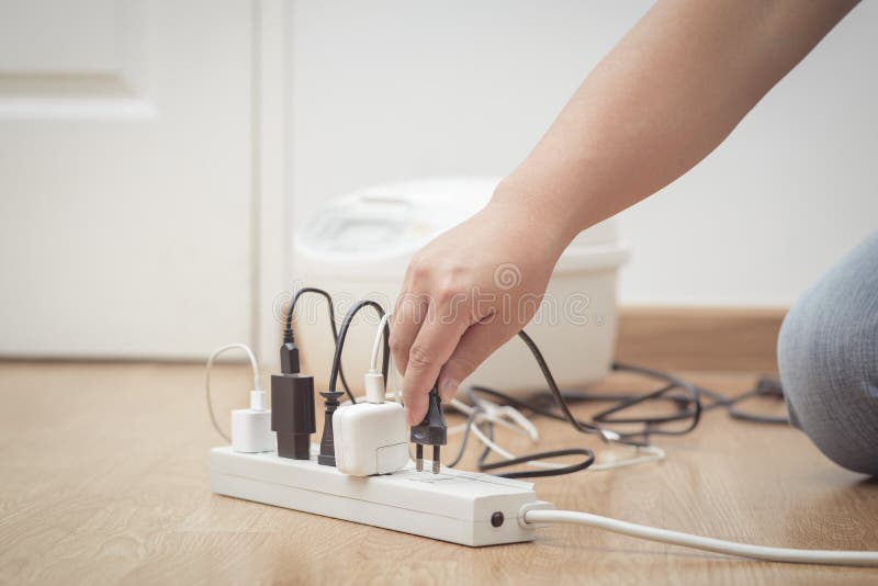 Man Unplugged Plug To Save on Energy Stock Image - Image of electricity ...