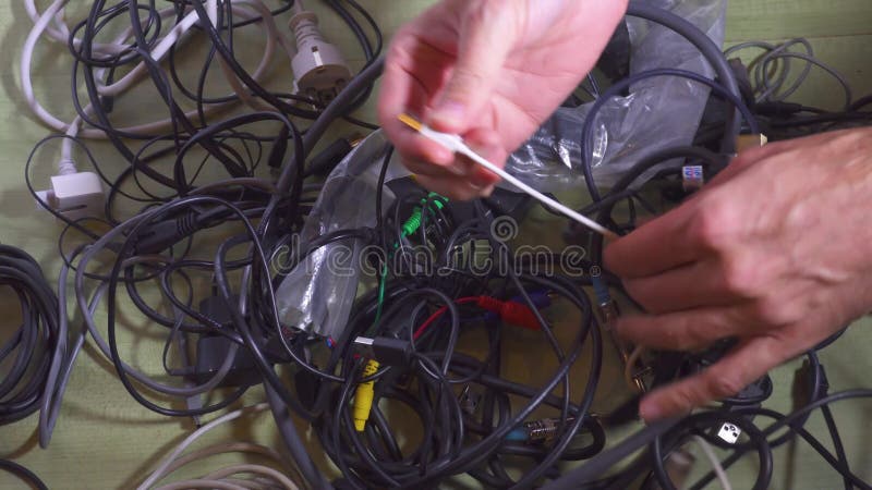Man Untangling Tangled Cables. Closeup. Stock Video - Video of grunge ...