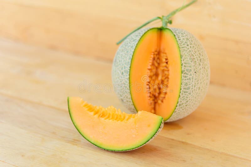 The Man Use Knife Split the Orange Melon Stock Image - Image of cutting ...
