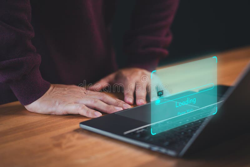 Man Use a Laptop Computer To Download and Update Software with Waiting ...