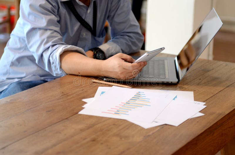 Mobility Worker Sitting at Co-working Space and Working Via Mobile ...