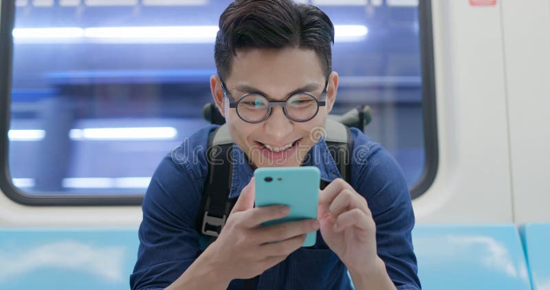 Man use phone in MRT stock image. Image of railway, message - 157786493