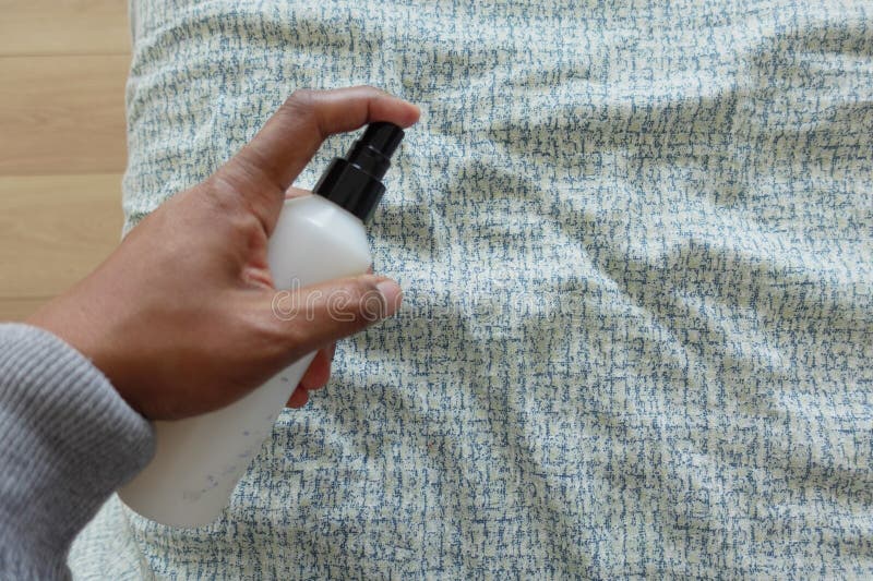 Man Use Spray for Clean the Bed at Home. Stock Image - Image of perfume ...