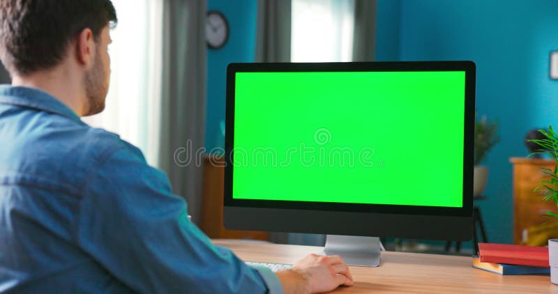 Man Uses All in One Computert with Blank Screen. Zoom Out on a Modern ...