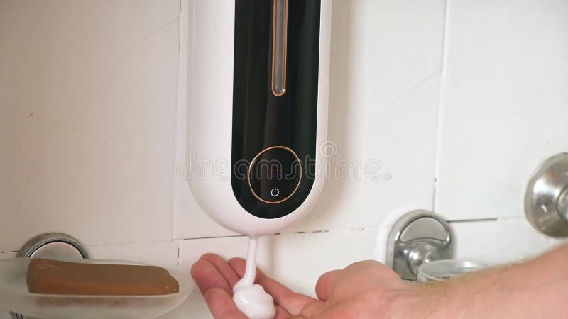 Man Uses Automatic Foaming Wall Mounted Motion Sensor Touchless Liquid ...