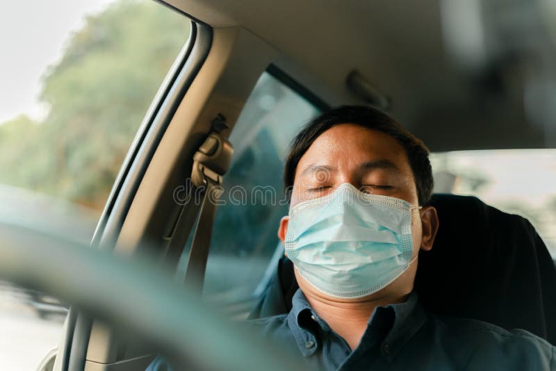 A Man Uses His Phone while Driving and Falls Asleep while Driving Stock ...
