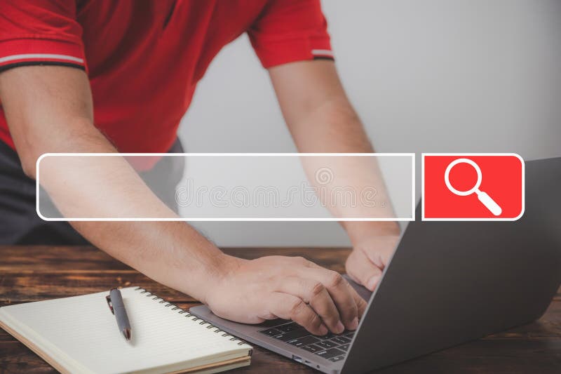 A Man Uses a Laptop or Computer To Search on a Browser Website Virtual ...