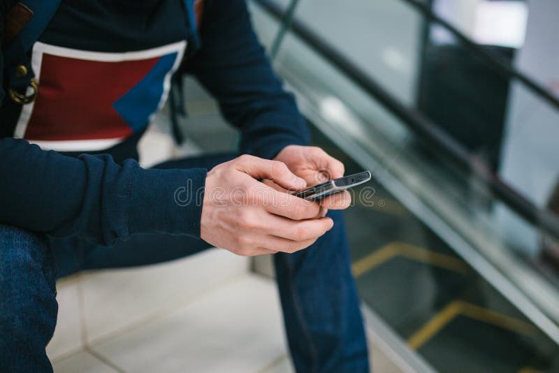 A Man Uses Mobile Phone Applications for Social Communication. Stock ...