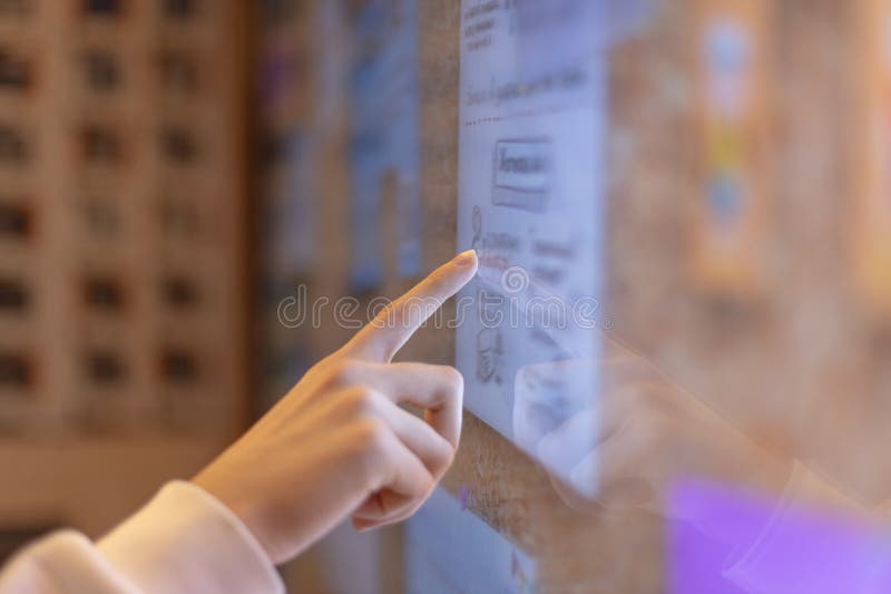 A Man Uses a Modern Interactive Touch Display of an Electronic ...