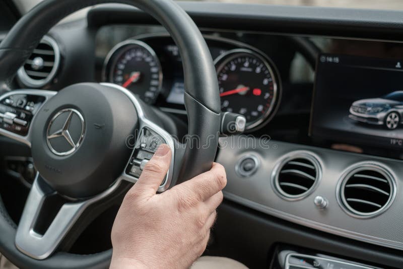 Man Uses Touch Controls on the Steering Wheel Editorial Stock Photo ...
