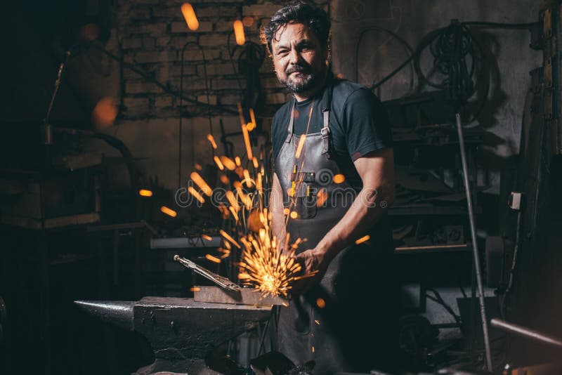 Man Using Angle Grinder in Factory and Throwing Sparks in Camera Stock ...
