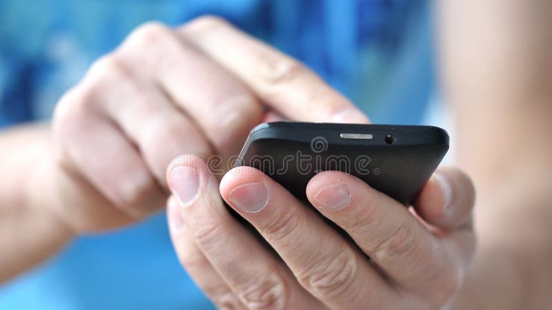 A Man Using Apps on a Mobile Touchscreen Smartphone Stock Photo - Image ...