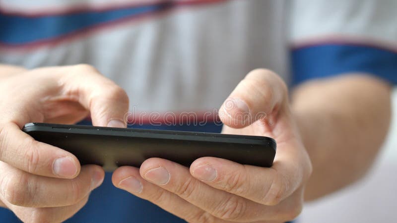 A Man Using Apps on a Mobile Touchscreen Smartphone Stock Photo - Image ...