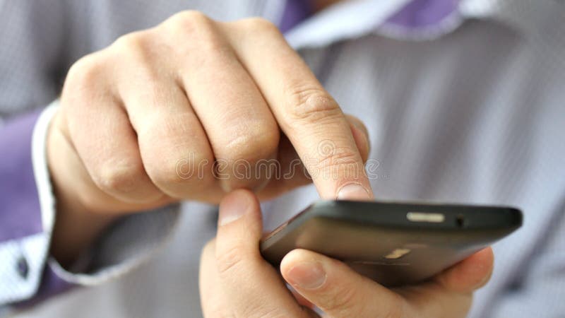 A Man Using Apps on a Mobile Touchscreen Smartphone Stock Photo - Image ...