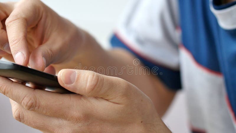 A Man Using Apps on a Mobile Touchscreen Smartphone Stock Photo - Image ...