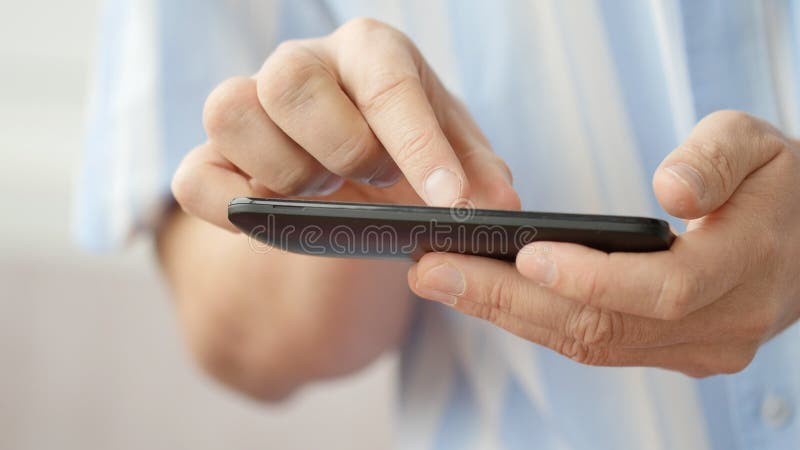 A Man Using Apps on a Mobile Touchscreen Smartphone Stock Image - Image ...