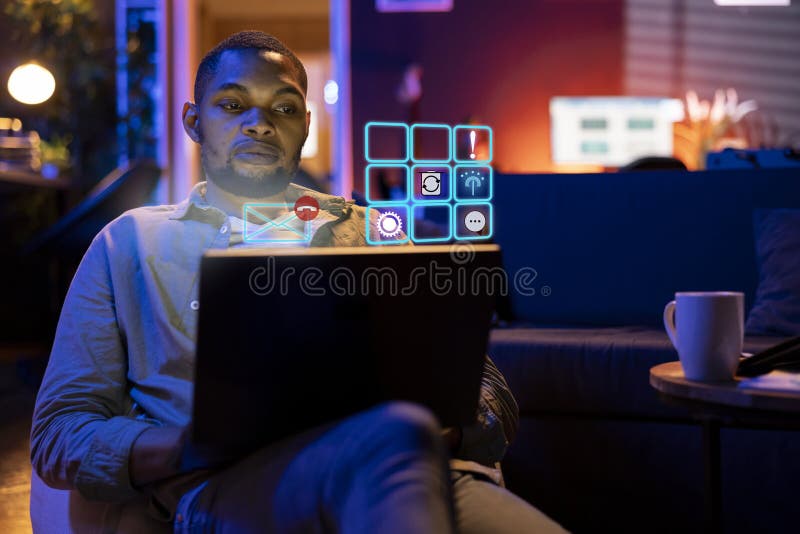 Man Using AR Tech To Interact with Laptop, App Icons on Grid ...