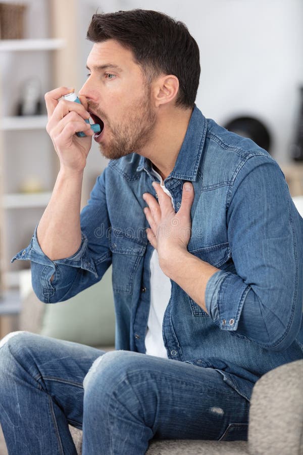 Man Using Asthma Inhaler at Home Stock Image - Image of exacerbation ...